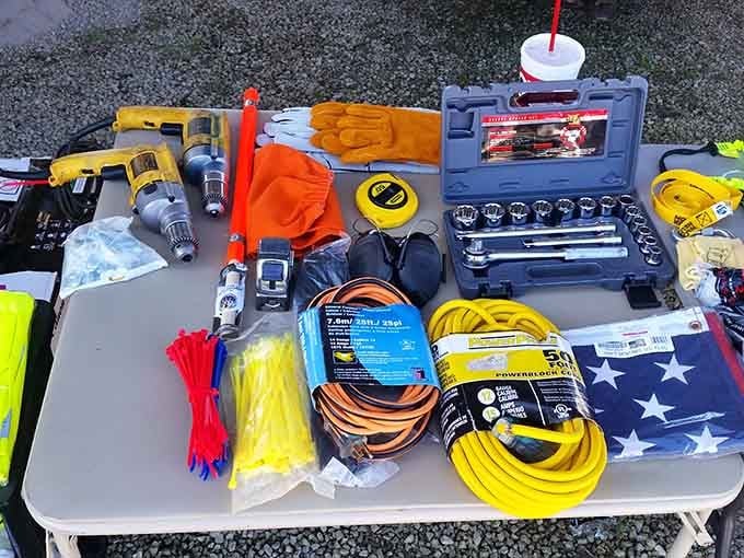 Tools and extension cords organized better than most hardware stores, proving that flea markets mean serious business too.