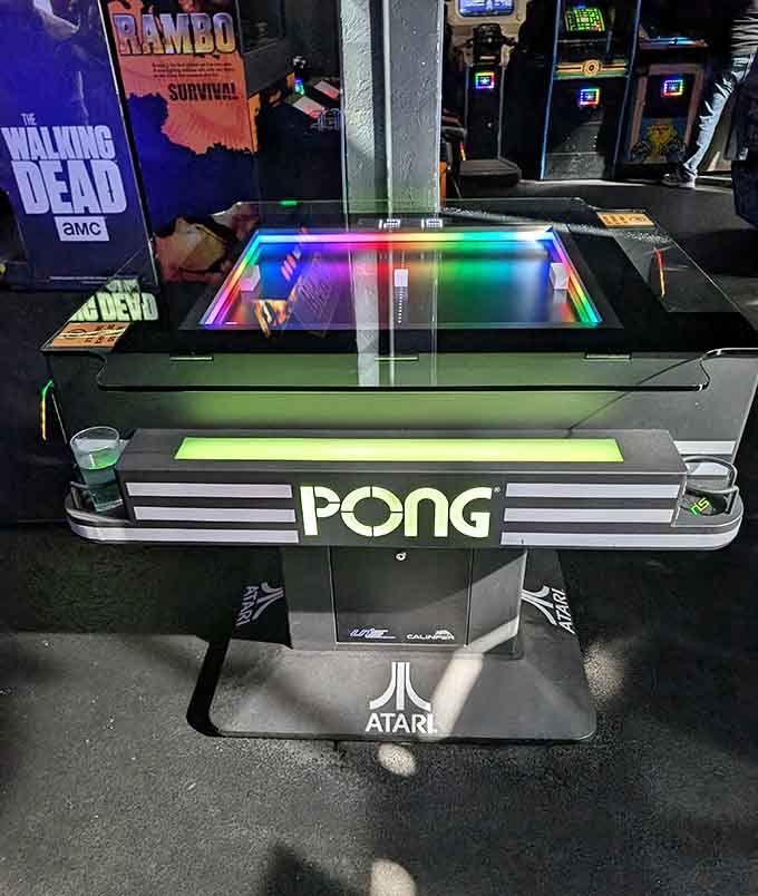 Atari's Pong gets the cocktail table treatment it deserves, turning gaming's simplest concept into social entertainment gold.