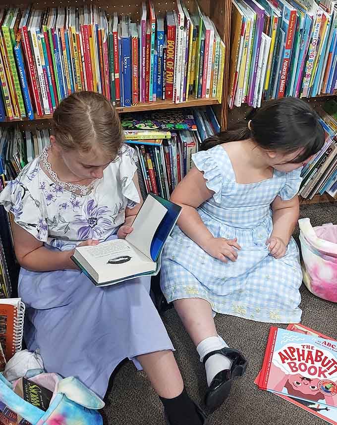Young readers lost in their books create the kind of scene that gives librarians and parents hope.