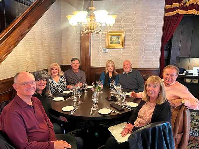 Happy diners gathered around the table, proof that great food brings people together in the best possible way.