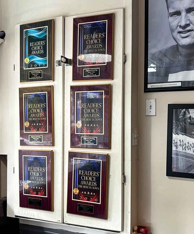 Reader's Choice Awards lining the wall like breakfast battle scars, proof that consistency and quality never go unnoticed.