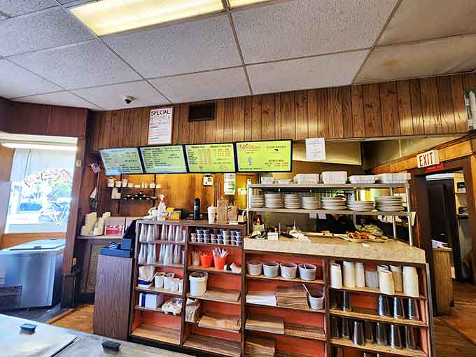 Behind the scenes, organized chaos meets old-school efficiency in this timeless ice cream parlor workspace.