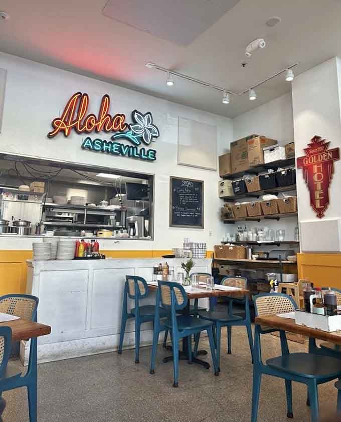 That "Aloha Asheville" neon says it all, welcoming you into a space where two food worlds collide beautifully.