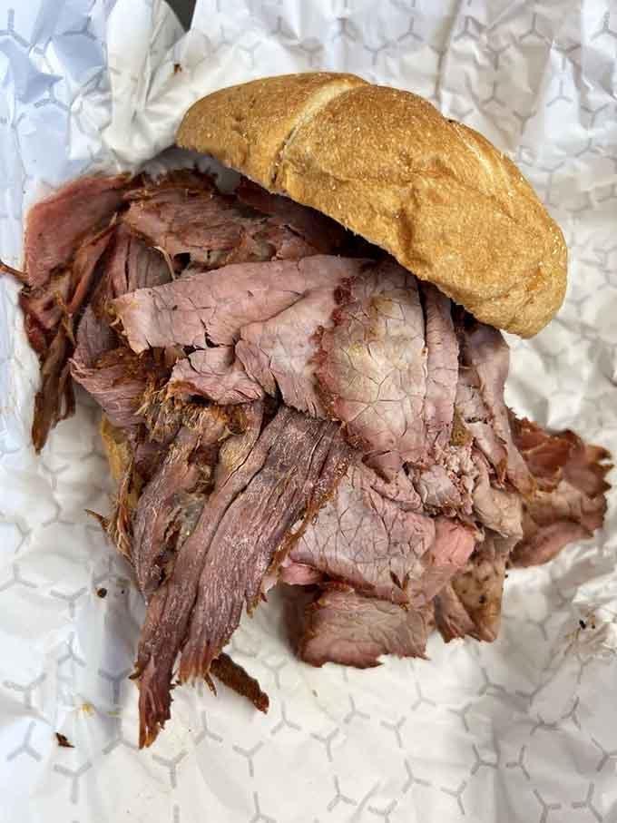 Beef piled impossibly high on a roll&mdash;this sandwich requires commitment, strategy, and possibly a structural engineer.