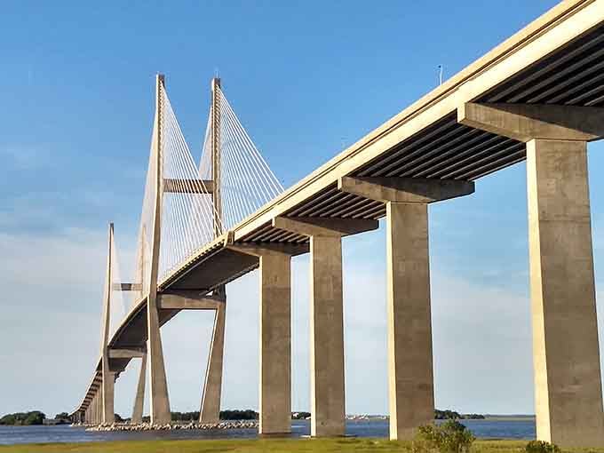 The Sidney Lanier Bridge arches gracefully toward Jekyll Island, your gateway to leaving the mainland's worries behind.