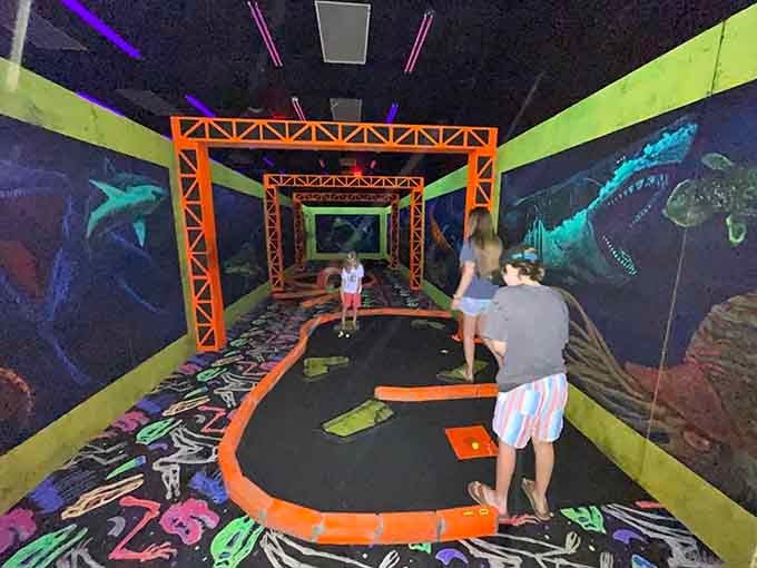 Families navigate the glowing course together, creating memories that'll outlast any dinosaur's reign on Earth.