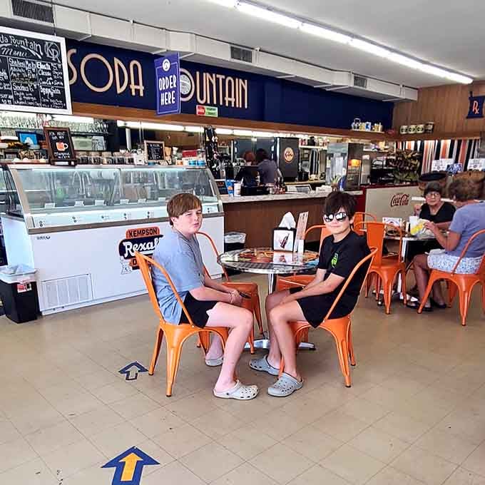 Young customers enjoying the same experience their grandparents did, creating memories that'll last beyond any smartphone's battery life.