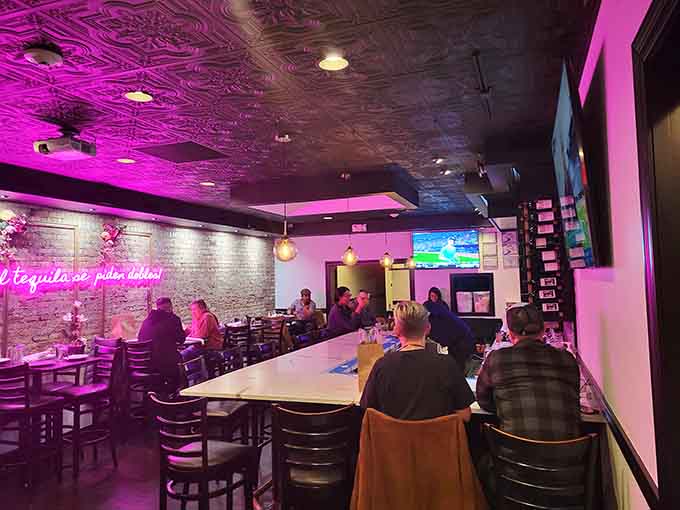 Counter seating with mood lighting, perfect for solo diners who want to watch the action without feeling lonely.