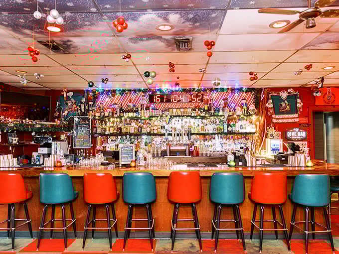 Orange and turquoise bar stools line up like candy canes, inviting you to settle in for the night.
