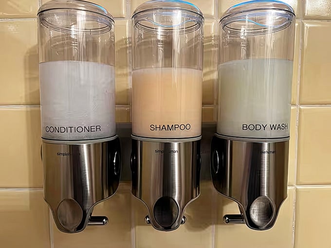 Wall-mounted dispensers for shampoo, conditioner, and body wash: small touches that show someone actually thought this through completely.