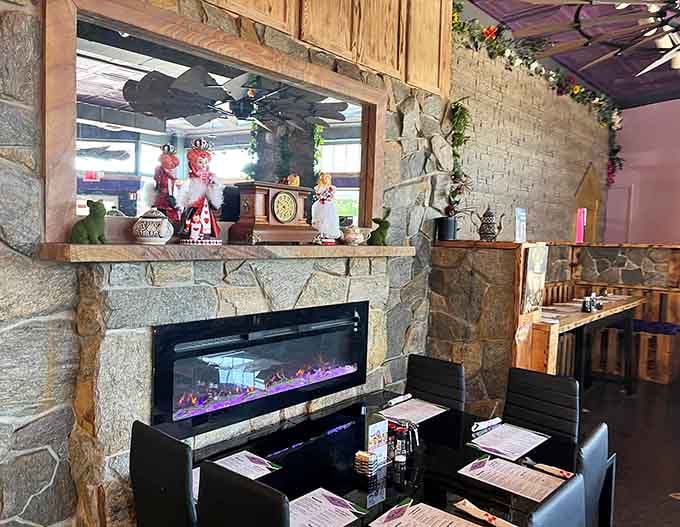 A stone fireplace surrounded by eclectic decor creates cozy corners perfect for escaping reality for an hour or two.