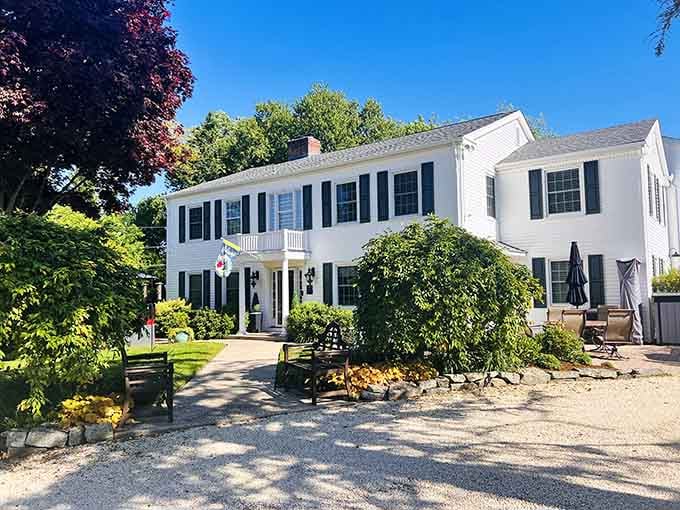 Classic New England elegance wrapped in white clapboard and black shutters, exactly as it should be.