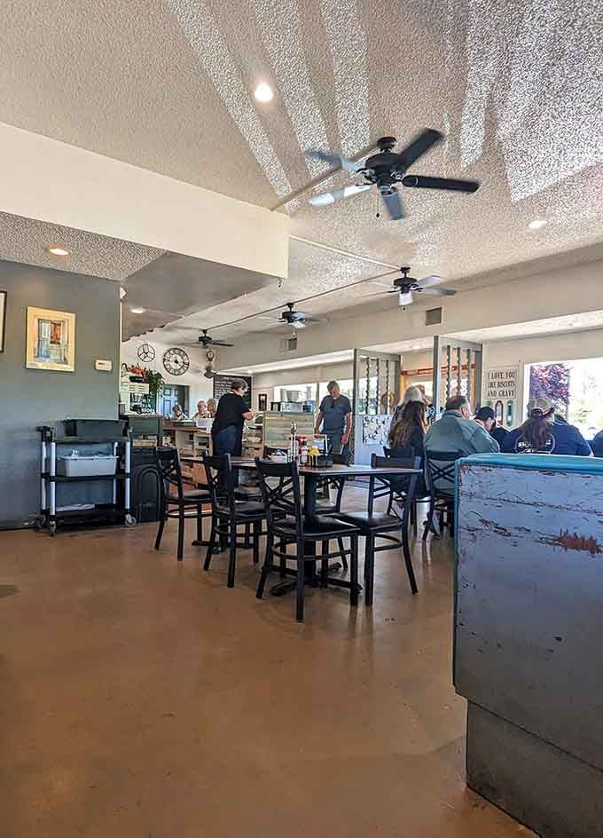 Ceiling fans spinning lazily overhead while diners enjoy their meals in a space that feels welcoming and unhurried.