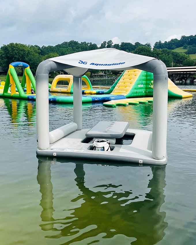 A floating cabana offers the perfect spot to catch your breath between obstacle attempts and contemplate your life choices.
