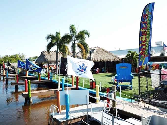 Tiki huts and fishing docks create the kind of casual waterfront scene that makes stress physically impossible to maintain.