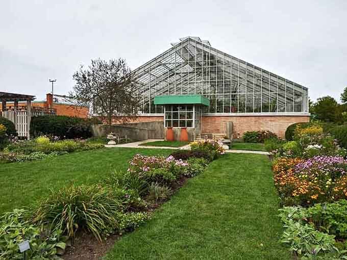 That glass conservatory is basically a spaceship that transports you to warmer, greener worlds instantly.