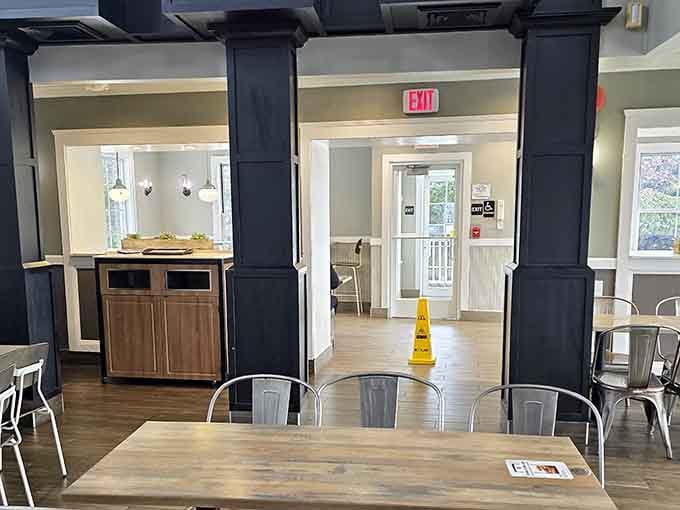 Dark columns frame your exit like you're leaving a performance, except the show was you eating McGriddles gracefully.
