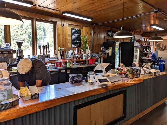 The counter where all the magic happens, complete with tap handles that promise cold refreshment after a day exploring the mountains.
