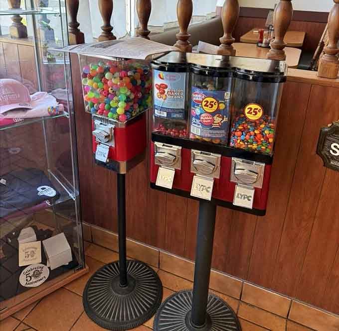 Vintage gumball machines stand guard, ready to add a sweet finale to your savory adventure here.