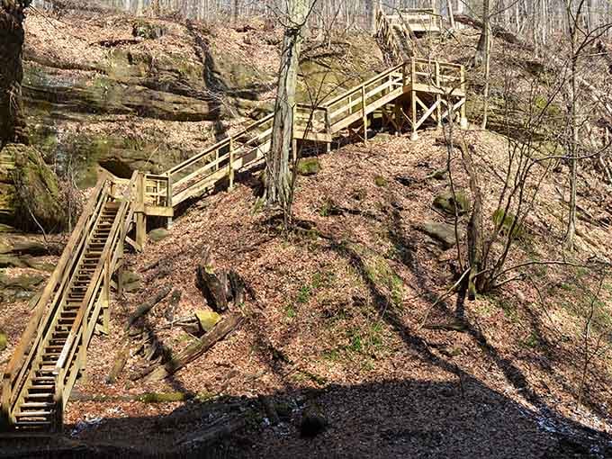 Wooden stairs descending into the gorge: your gateway to waterfalls and the kind of peace money can't buy.