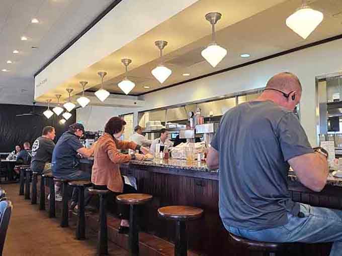 Counter seating for solo diners who appreciate watching kitchen ballet while enjoying their perfectly cooked eggs.