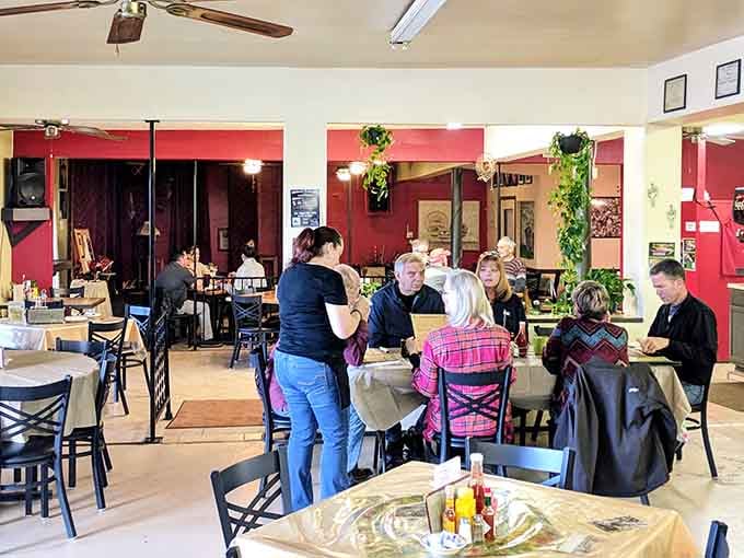 Real people enjoying real food in a real community gathering spot, exactly as dining should be.