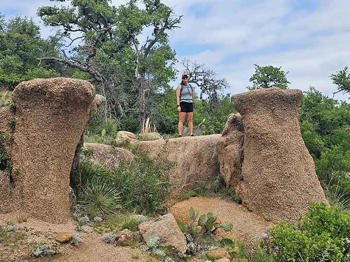 Standing atop these weathered rocks feels like conquering Everest, except you can still get cell service and decent barbecue afterward.
