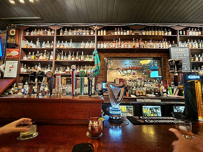 The iconic Guinness harp tap handle stands sentinel over a bar that clearly takes its Irish heritage seriously.