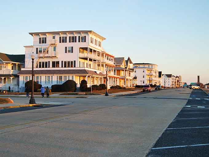 Morning light bathes the oceanfront in golden hues, making early risers feel exceptionally wise and virtuous.