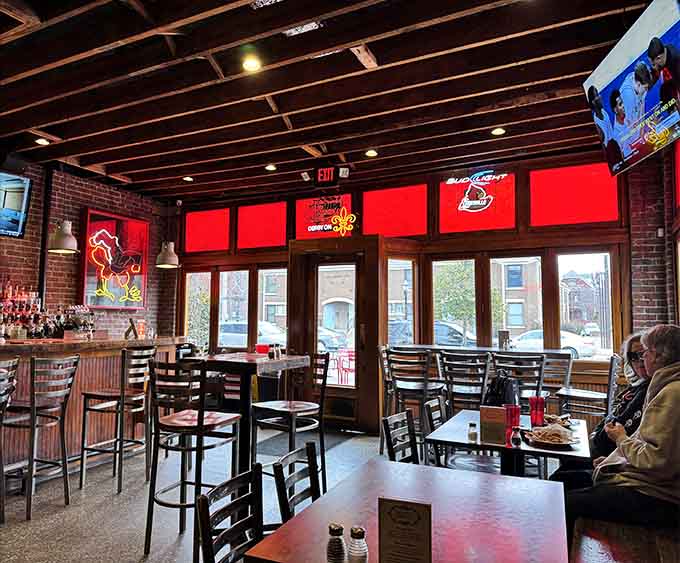 Large windows flooding the space with natural light, proving taverns don't have to feel like caves anymore.