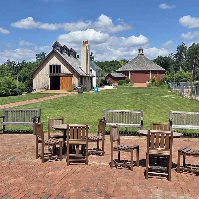 Outdoor seating overlooks historic farmsteads, offering peaceful views that beat any restaurant patio in the modern world hands down.