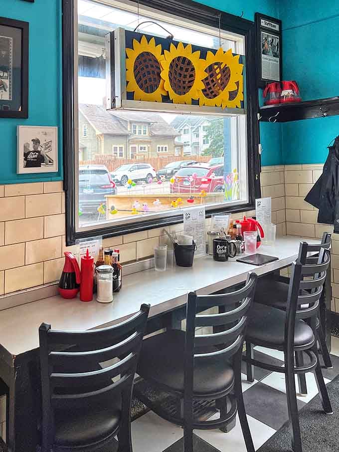 Window seats with cheerful sunflower decorations make every breakfast feel like a celebration of simple pleasures and good company.