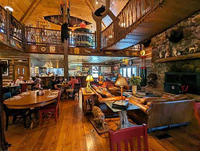 Rustic lodge seating with soaring ceilings makes every meal feel like a special occasion worth celebrating properly.