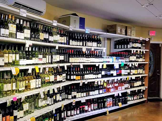 The wine shop section offers an extensive selection of bottles, turning dinner into a complete wine country experience.