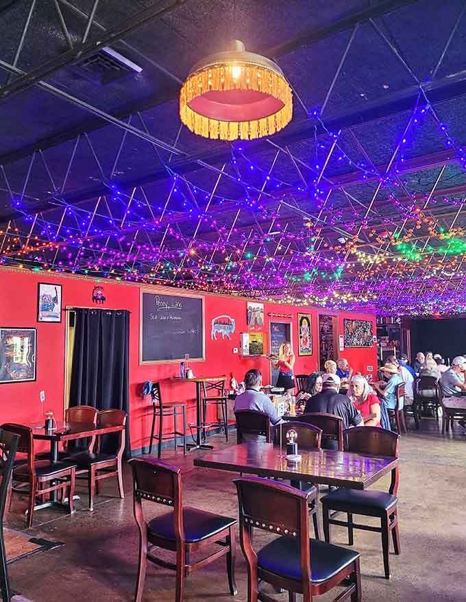 Red walls covered in Beatles posters and those magical ceiling lights create the ultimate rock and roll dining room.