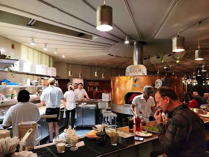 Watching the kitchen crew work that oven is better than most cooking shows on television.