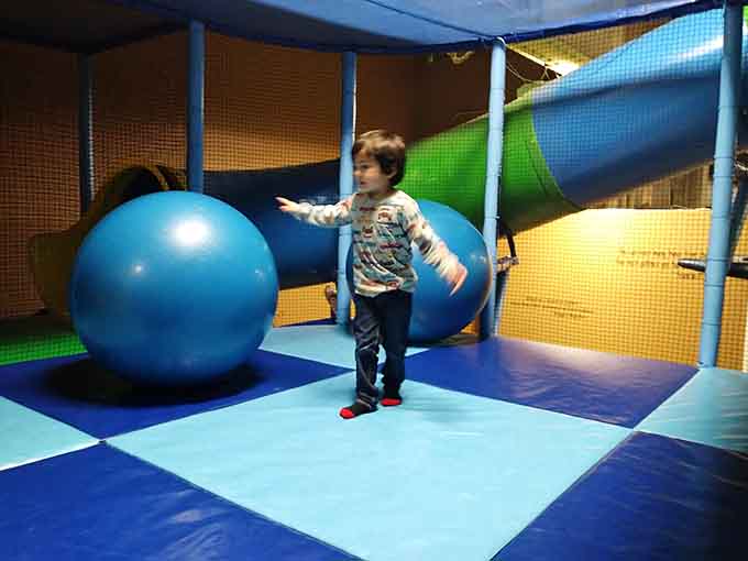 Giant blue balls in the toddler area provide gentle fun for the smallest sailors still finding their sea legs.
