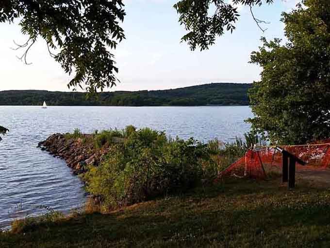 Where lake meets land in a gentle conversation of water, rock, and shoreline that's been ongoing for centuries.