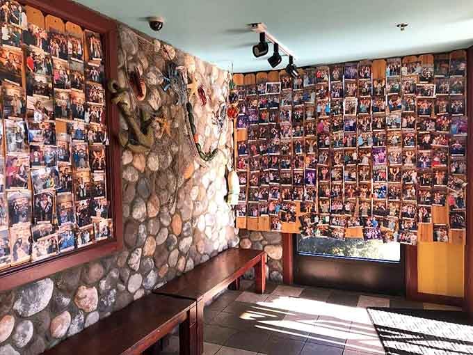 Walls covered in happy customer photos tell the story of countless celebrations and satisfied seafood lovers over the years.