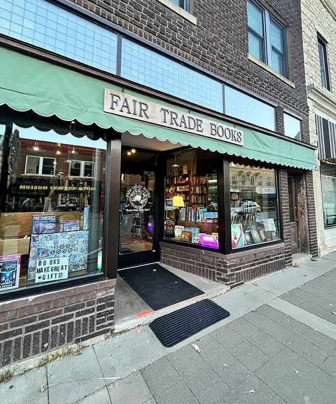 Fair Trade Books beckons bibliophiles with that mint-green awning, a literary oasis for readers seeking their next great discovery.