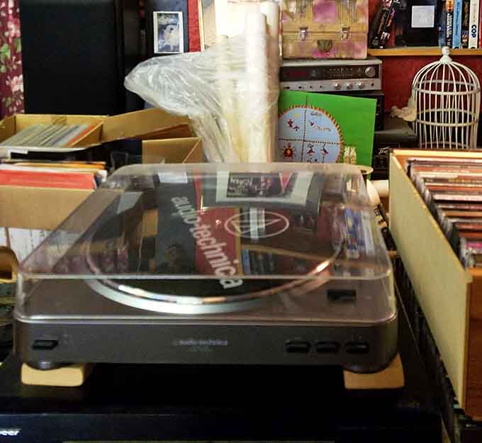 A turntable ready for action, because some of us still believe music sounds better when it requires actual physical effort.