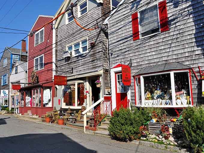 Weathered shingles and colorful storefronts create a shopping experience that feels authentically New England through and through.