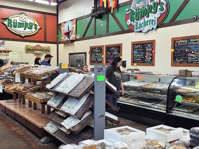 Real customers loading up on baked goods, living proof that this hidden gem has been thoroughly discovered by smart locals.