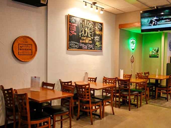 Simple wooden tables and bright walls create a space where the food becomes the real star.