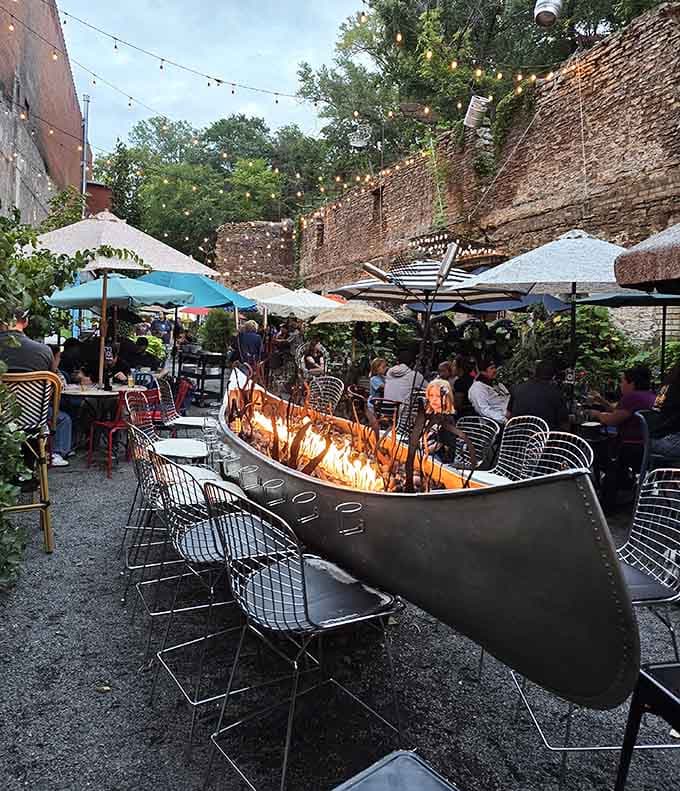 A canoe transformed into a fire pit seating area, proving that Minnesota knows how to repurpose with serious style.