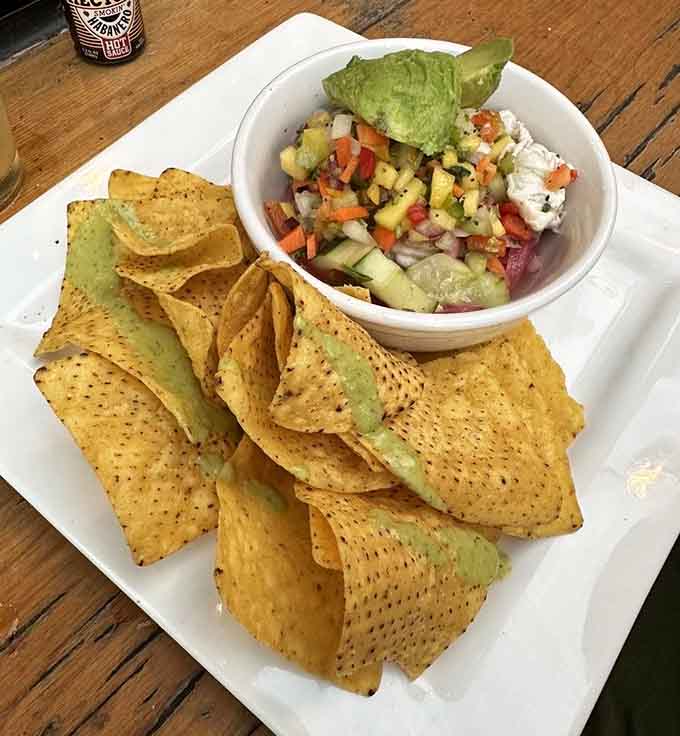 Fresh ceviche with chips that actually stay crispy, proving the kitchen understands both flavor and the physics of food.