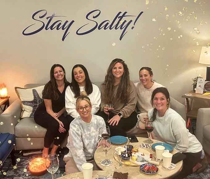 Happy visitors proving that group wellness experiences beat another book club meeting any day.