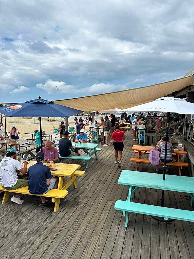Deck seating with umbrellas for when the sun gets too enthusiastic about its job, which happens often here.