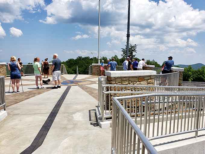 Fellow adventurers gather at the summit, united by the universal language of spectacular views and accomplishment.
