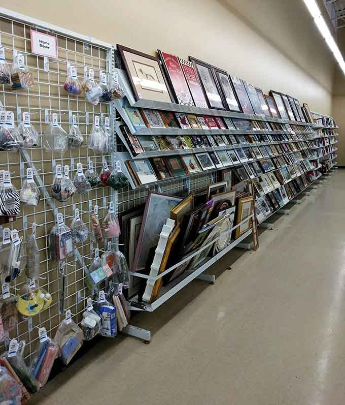 Framed art leans against walls like a gallery opening where every piece costs less than your morning coffee.